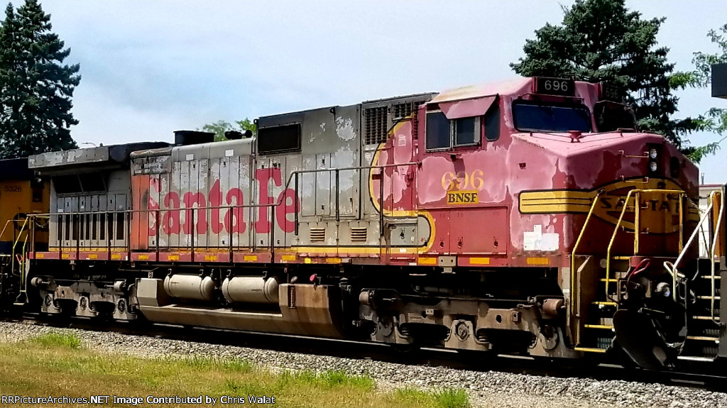 BNSF #696 a former ATSF Warbonnet trails 2nd out on a east bound manifest.